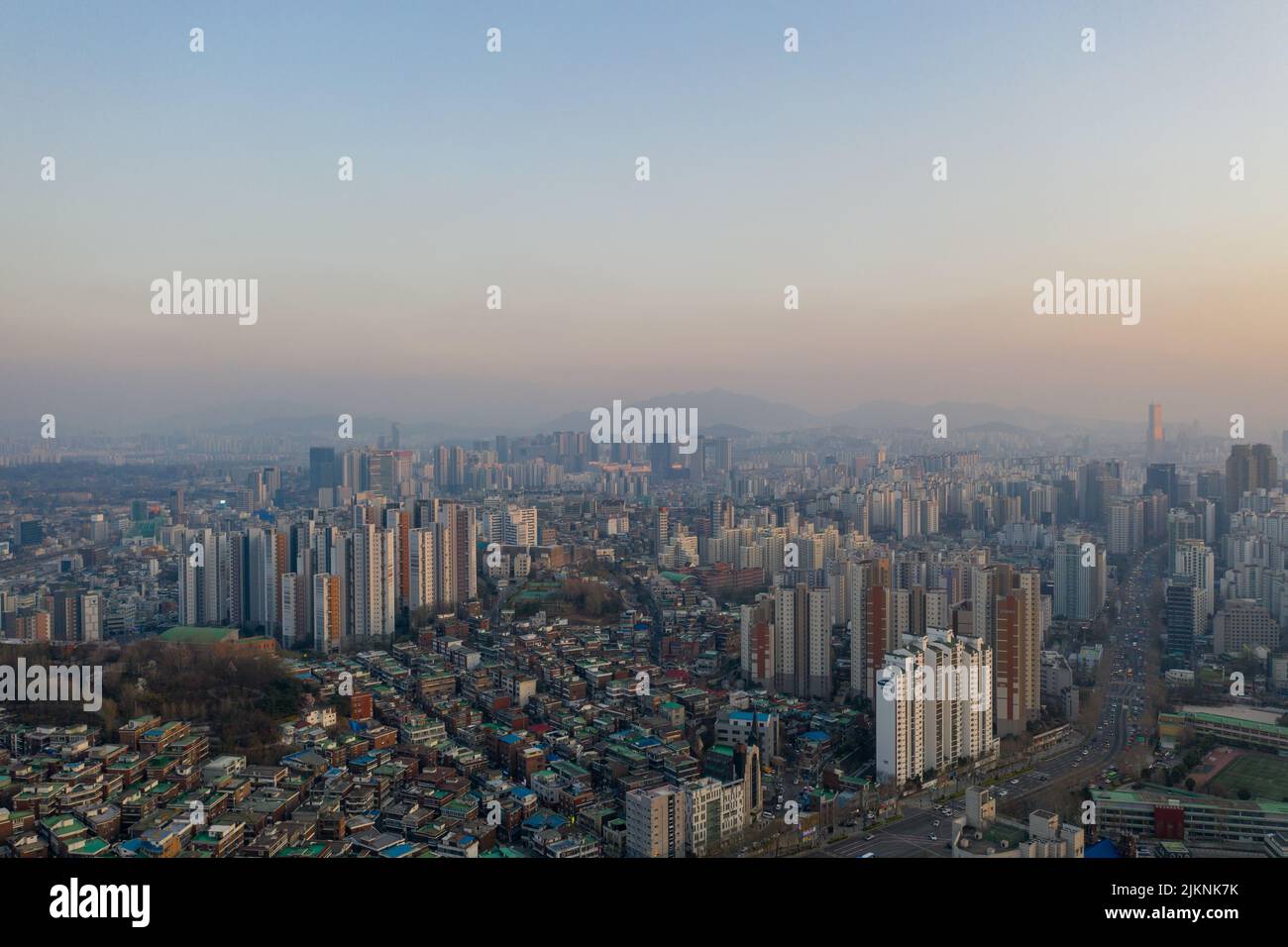 Beautiful cityscape with skyscrapers and a river Stock Photo - Alamy