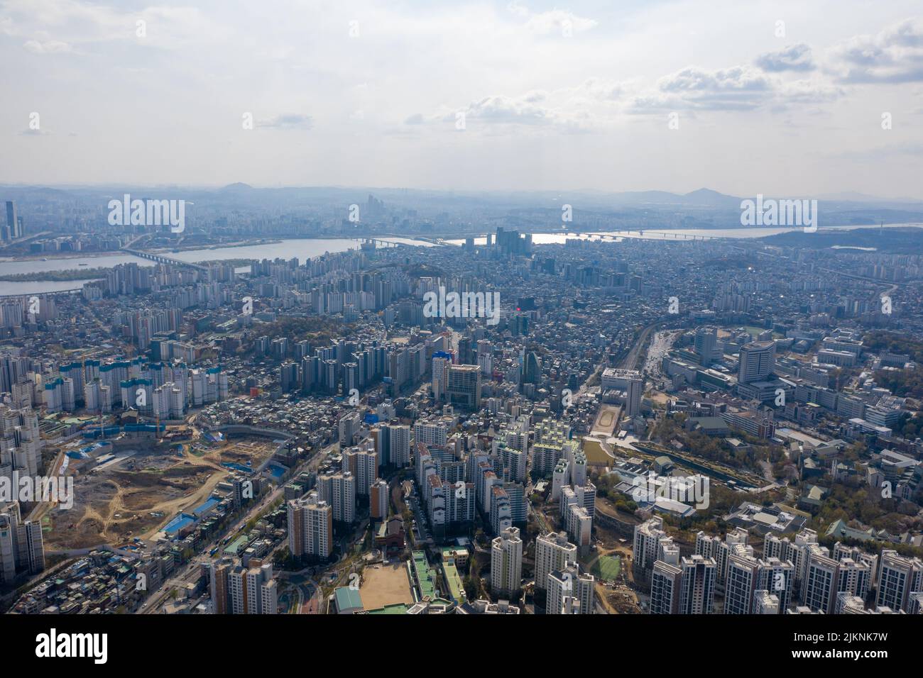 Beautiful cityscape with skyscrapers and a river Stock Photo - Alamy