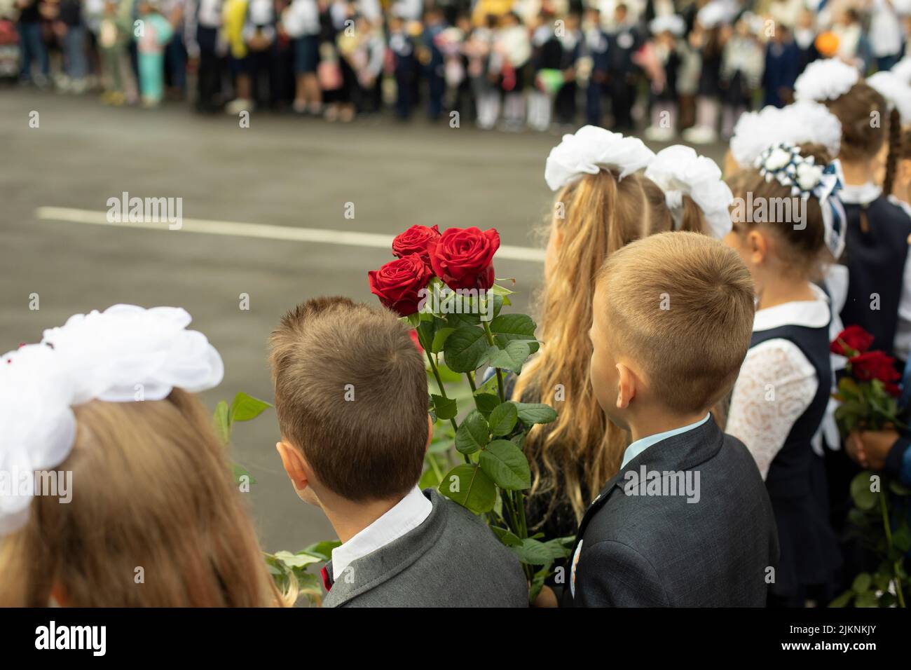 Knowledge Day in Russia. Children with flowers. First graders on ...