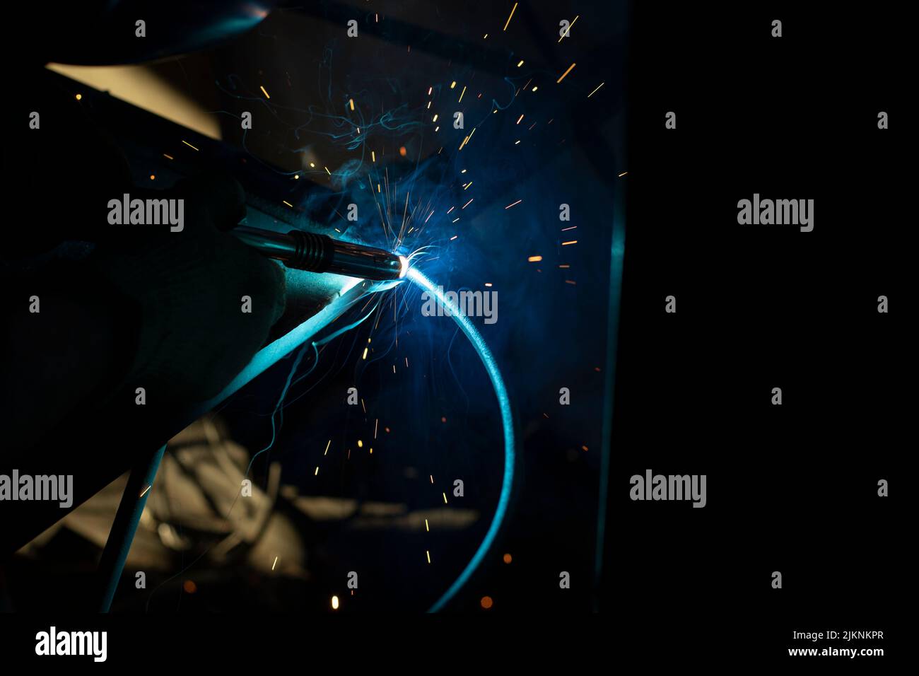 Metal welding. Work on steel. Fire from welding. Production details ...