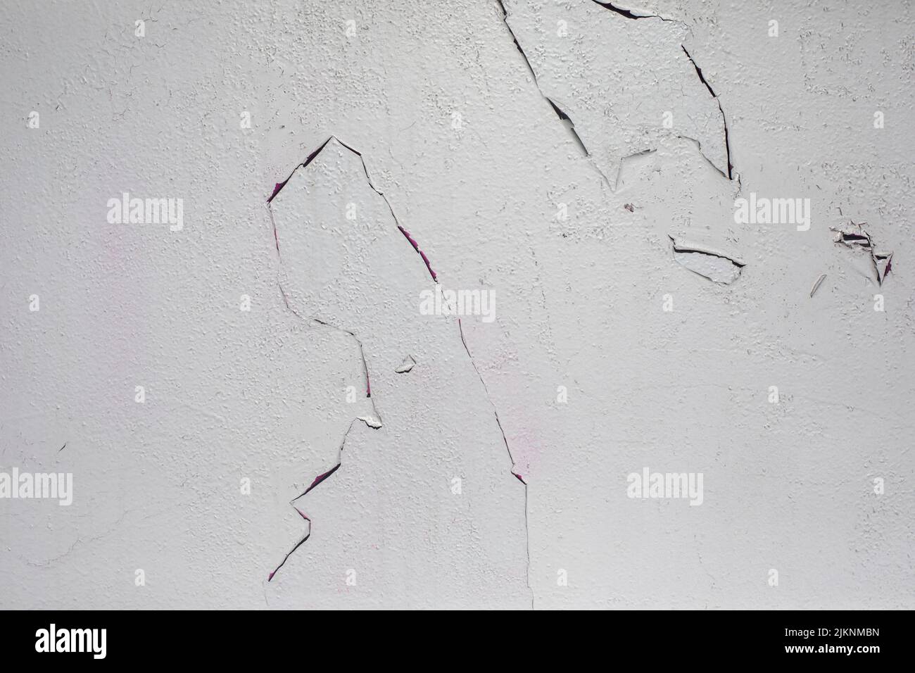 Texture of wall is in gray paint. Poorly painted wall surface. Uneven ...