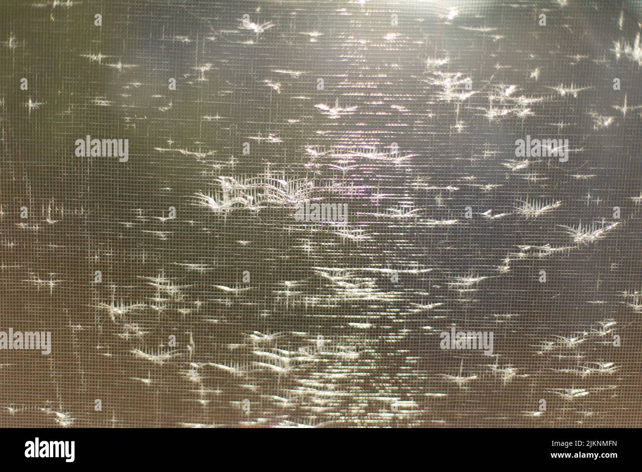 Grid in sun. Grid on window. Window details. Background of rays of ...