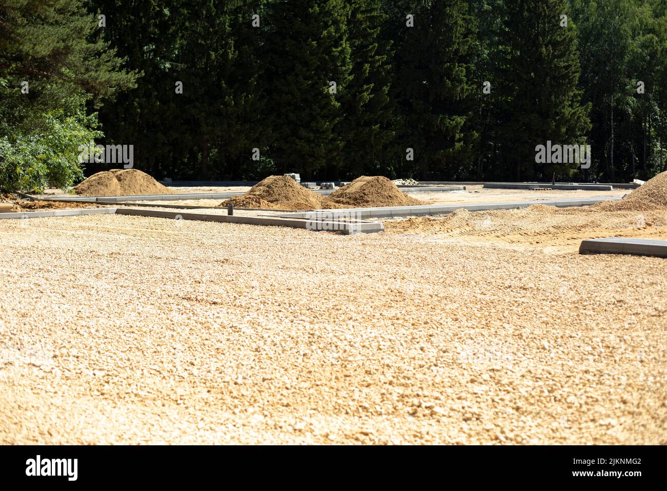 Construction site. Construction of parking in city. Embankment for ...