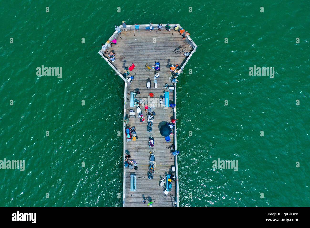 Aerial View top down of people fishing on the end of the Virginia Beach ...