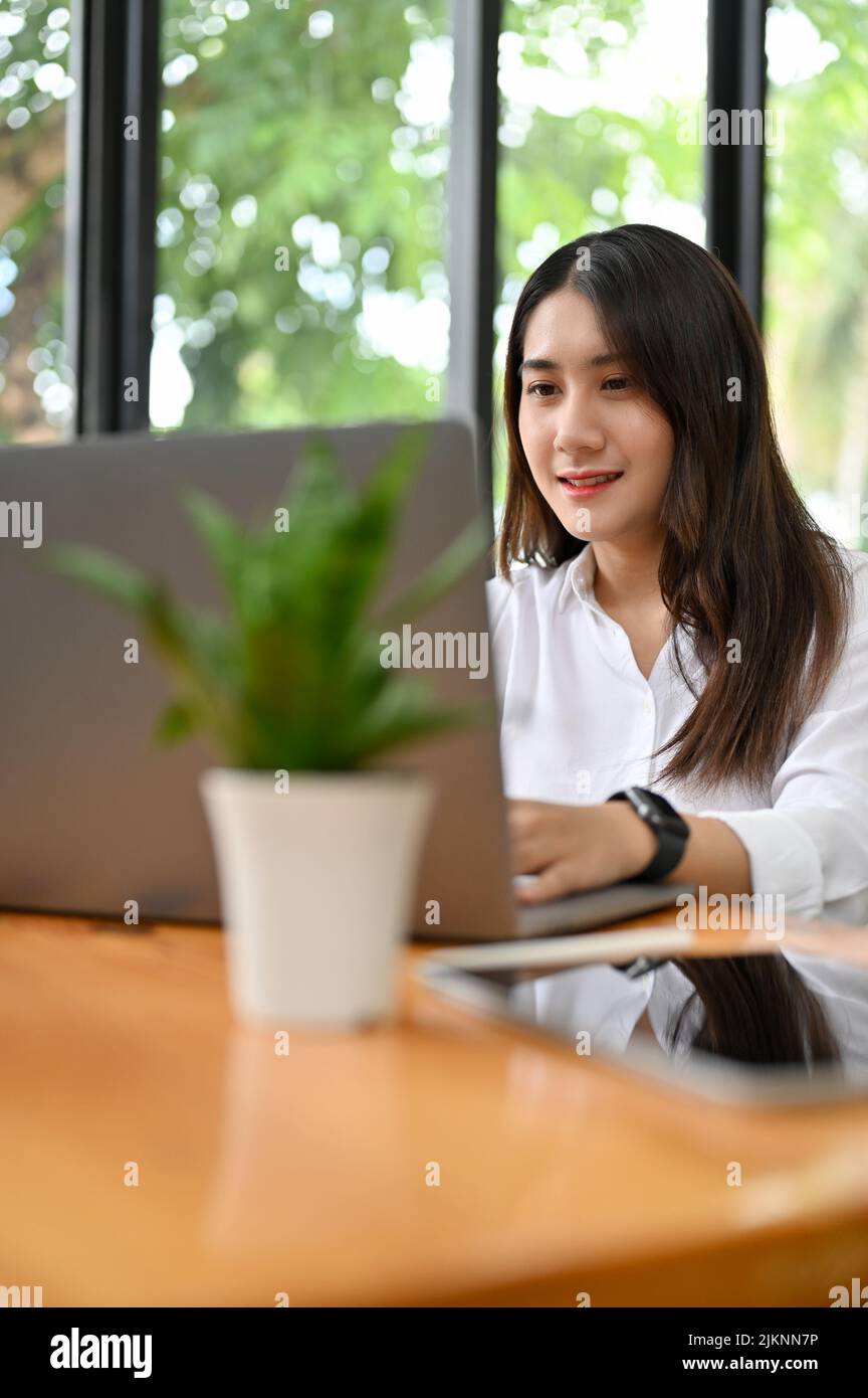 Portrait, Beautiful young Asian female office worker or employee ...