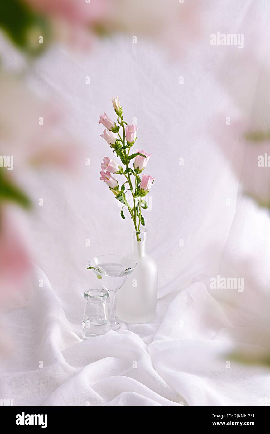 A vertical shot of a bouquet of eustomas in the vase Stock Photo - Alamy