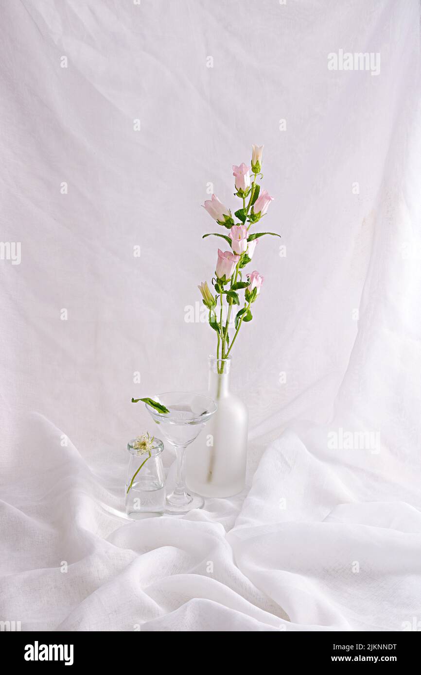 A vertical shot of a bouquet of eustomas in the vase Stock Photo - Alamy