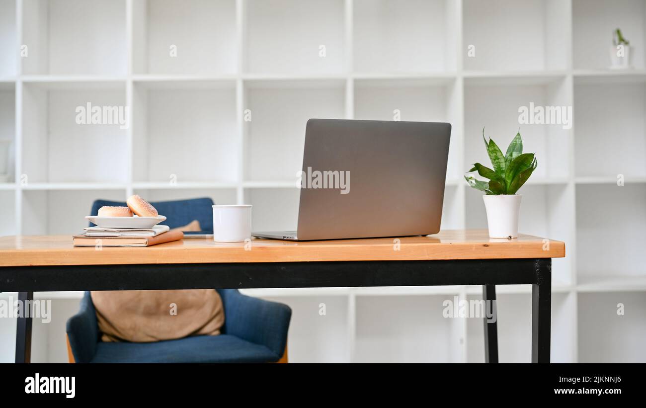 Modern office room working space with laptop computer and office ...