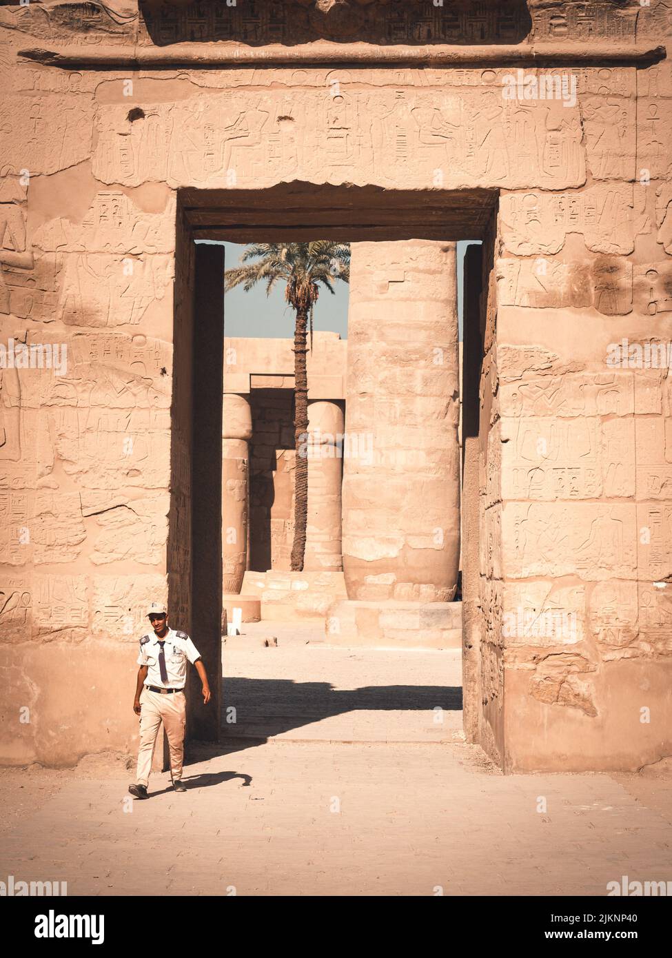 A vertical shot of the ancient remnants of the Karnak temple in Luxor ...
