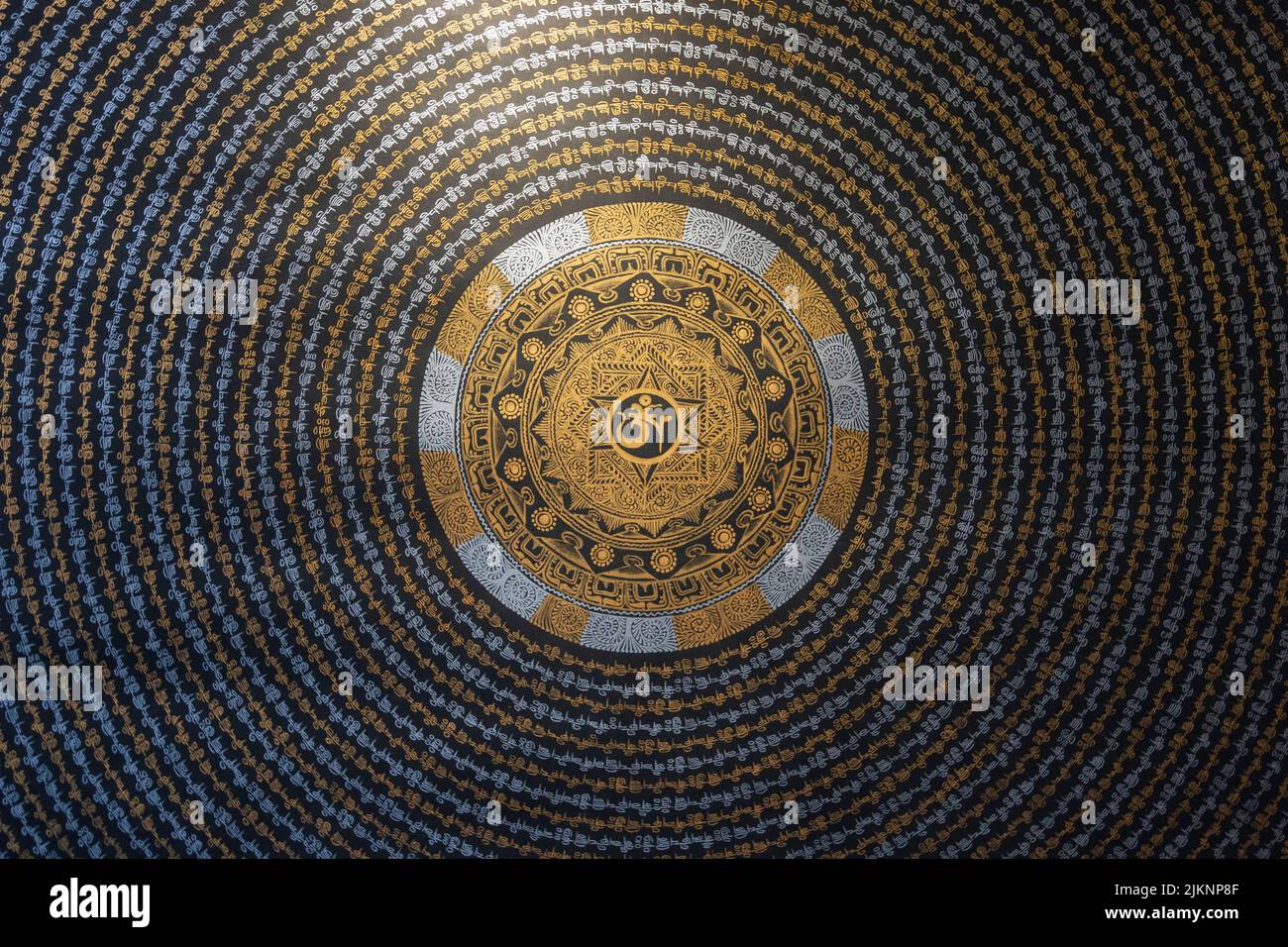 Close up of a text including the buddhist mantra Om Mani Padme Hum ...