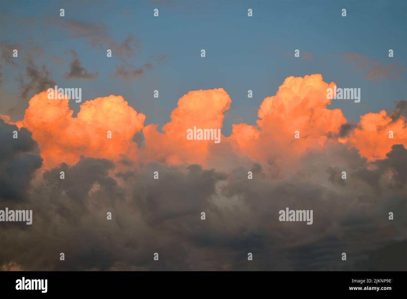 red clouds on dark tunderstorm sky, sunset, sunny environment diversity ...
