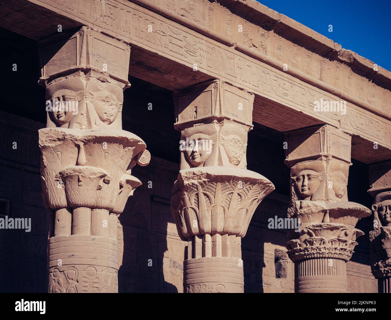 A line of columns of an ancient Egyptian style building in Aswan Stock ...