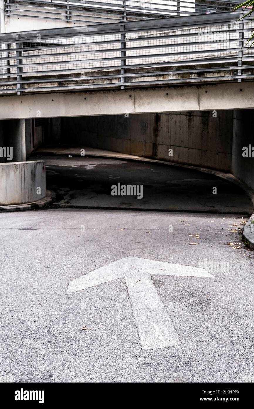 traffic sign with an arrow in a street Stock Photo - Alamy