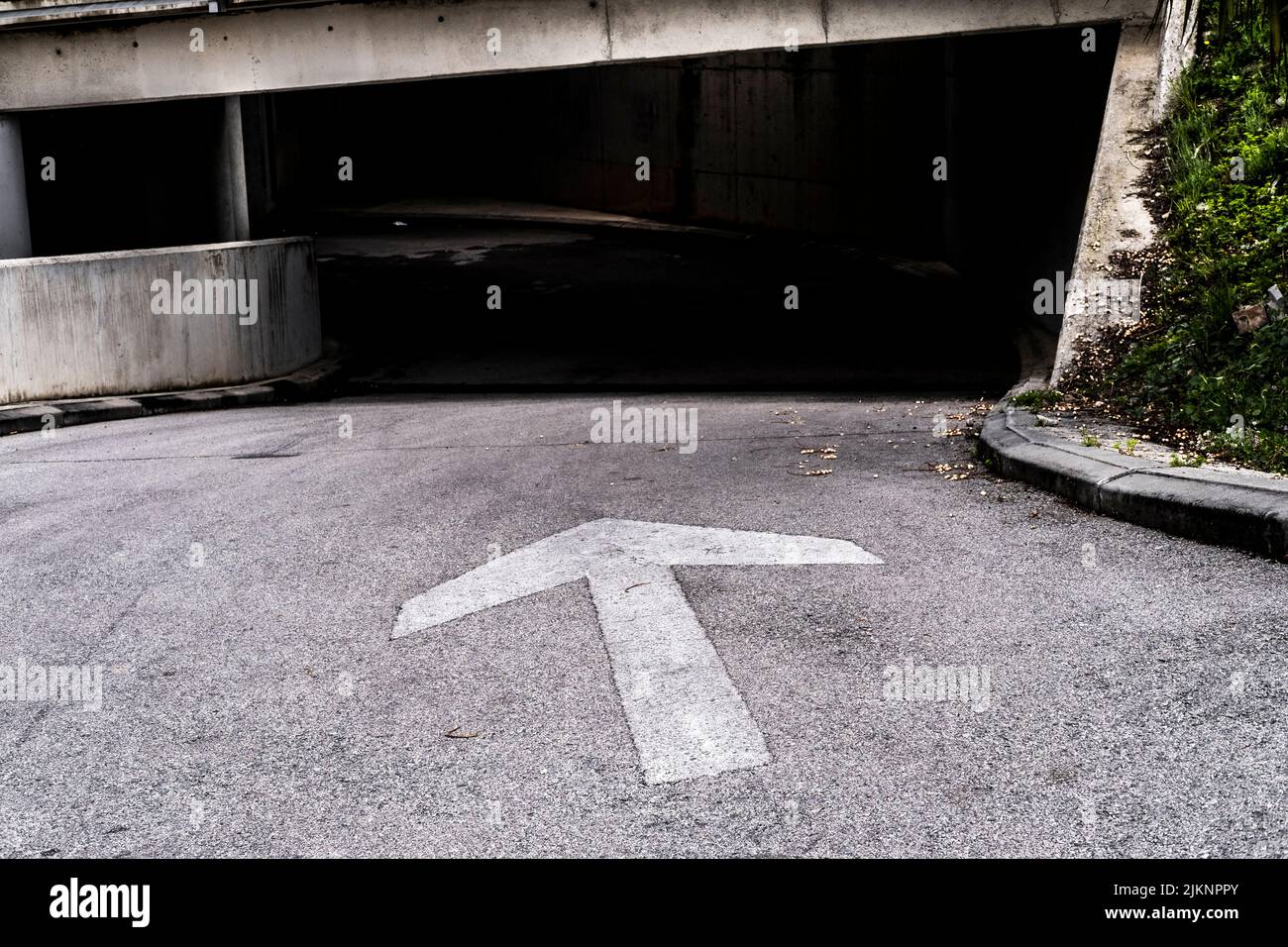 traffic sign with an arrow in a street Stock Photo - Alamy