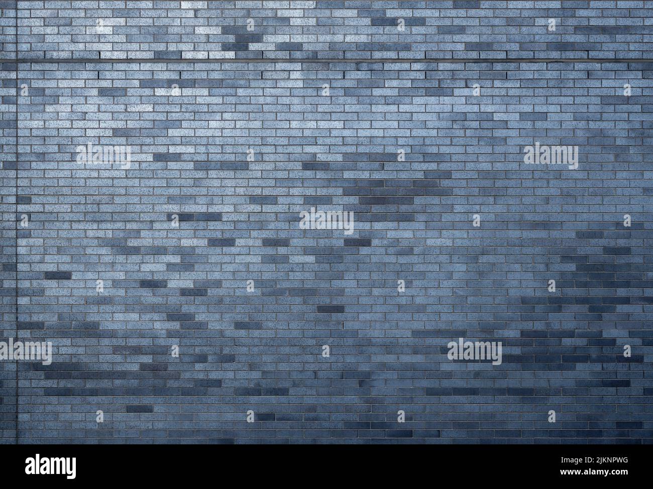 A closeup of a cool grey brick wall texture, great for backgrounds or ...