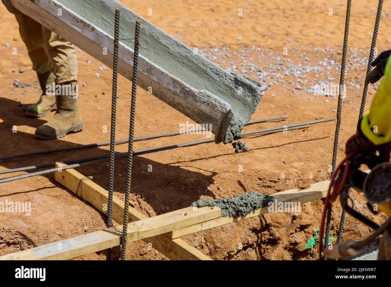 In the construction of a house, trenches are poured to serve as the ...