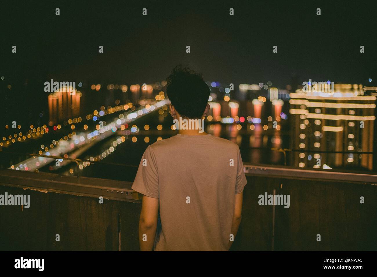 Man standing in balcony hi-res stock photography and images - Alamy