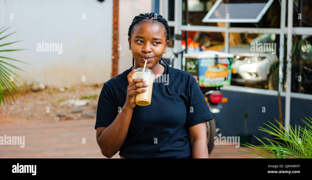 African people drinking hi-res stock photography and images - Alamy