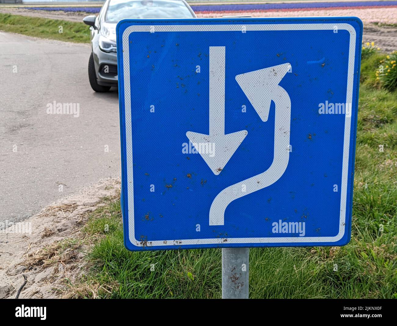 A closeup of a Passing area on right-hand side of the road sign on the ...