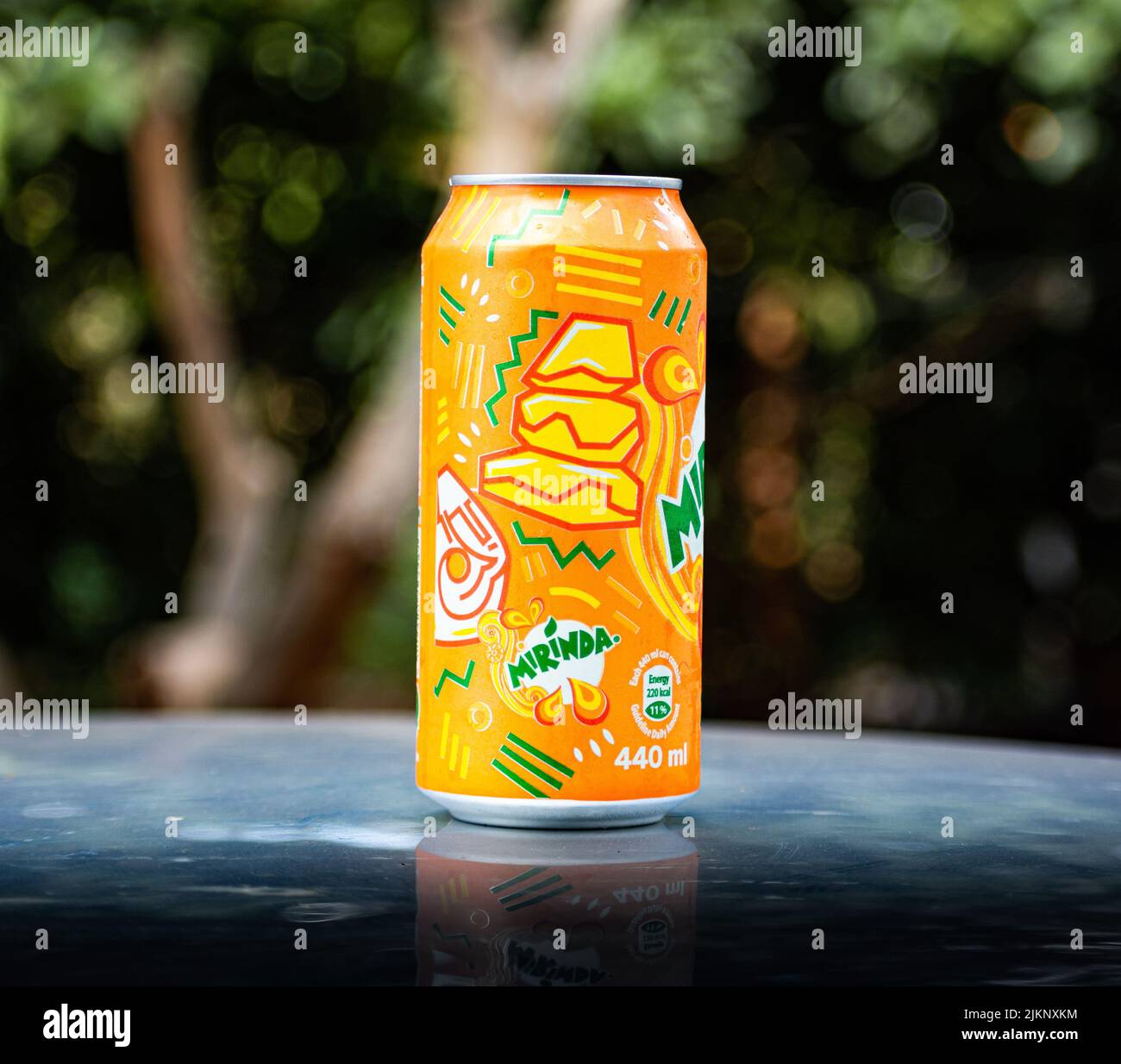An aluminum can of orange Miranda in zim campaign on a blurred ...