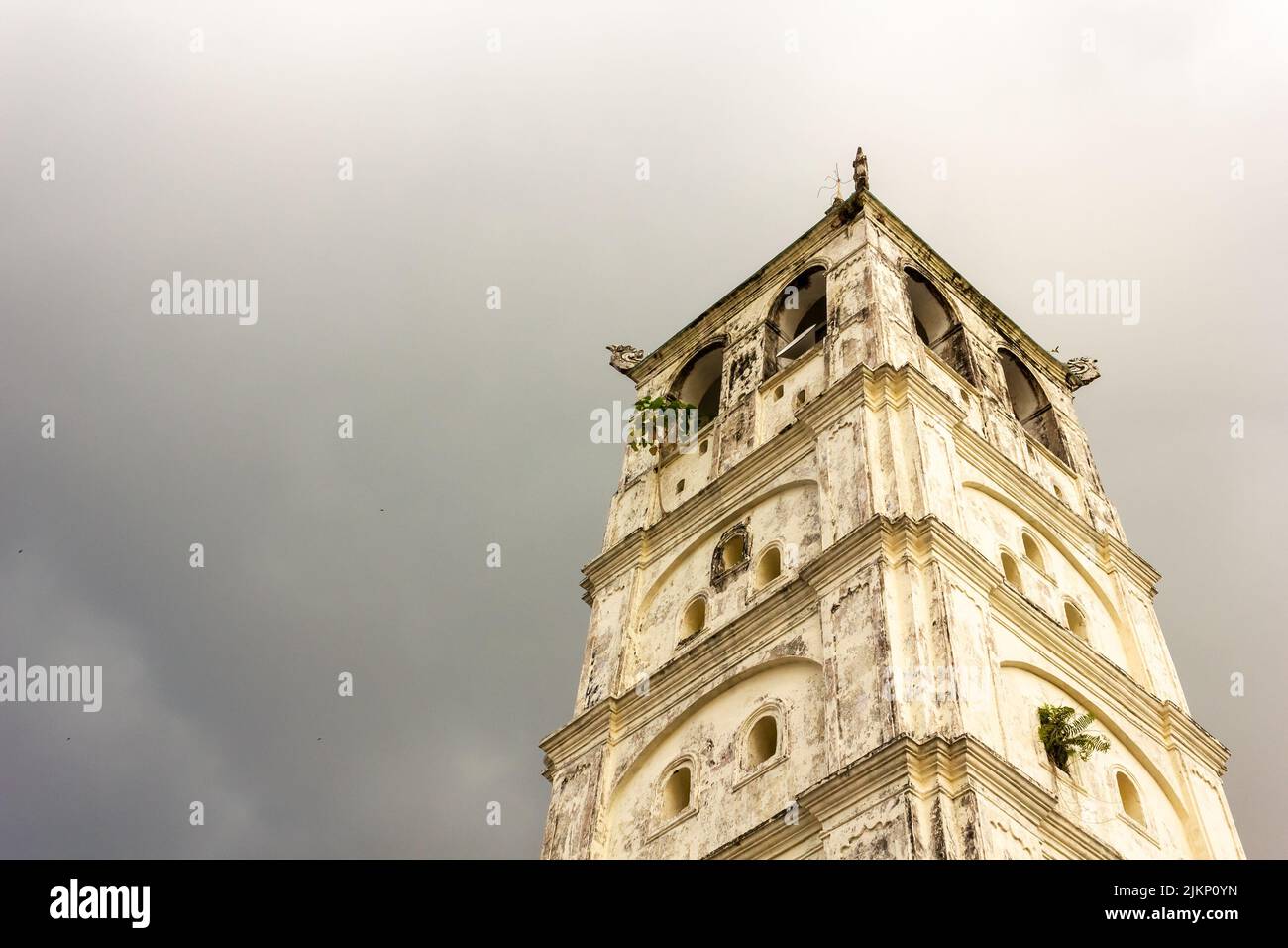 Melaka, Malaysia - October 2012: The ancient tower at the 18th century ...