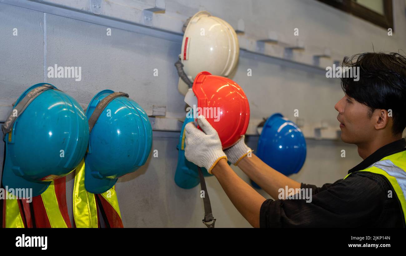 African American holding Safety Helmet , Safety helmet equipment in ...