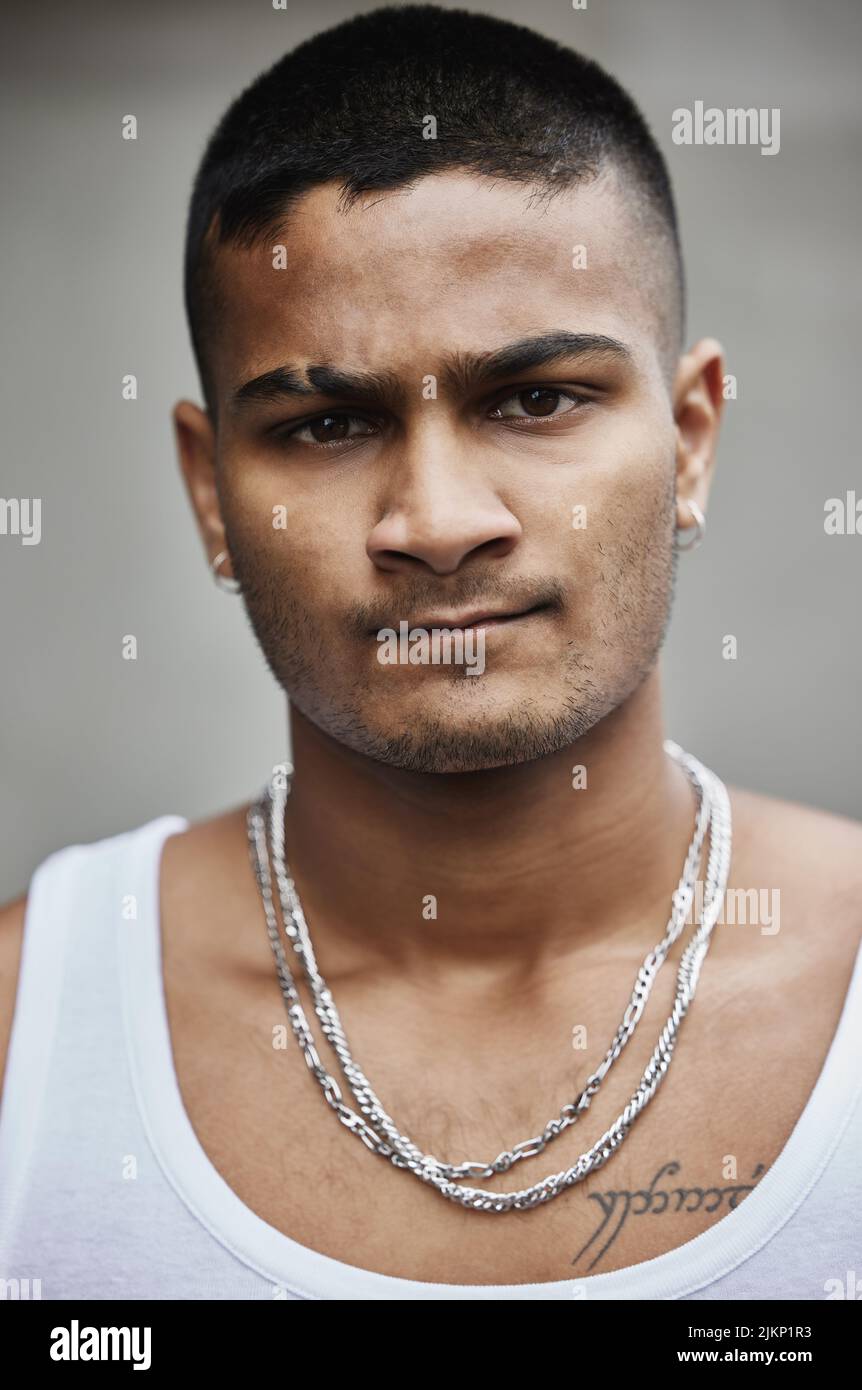 Street life. Cropped portrait of a handsome young male gangster ...
