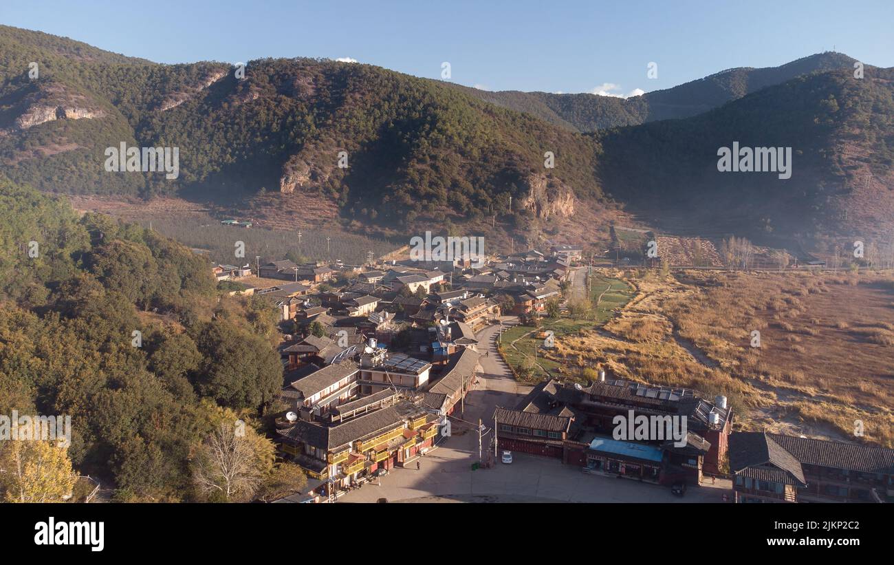 An aerial view of a small asian village with traditional buildings ...