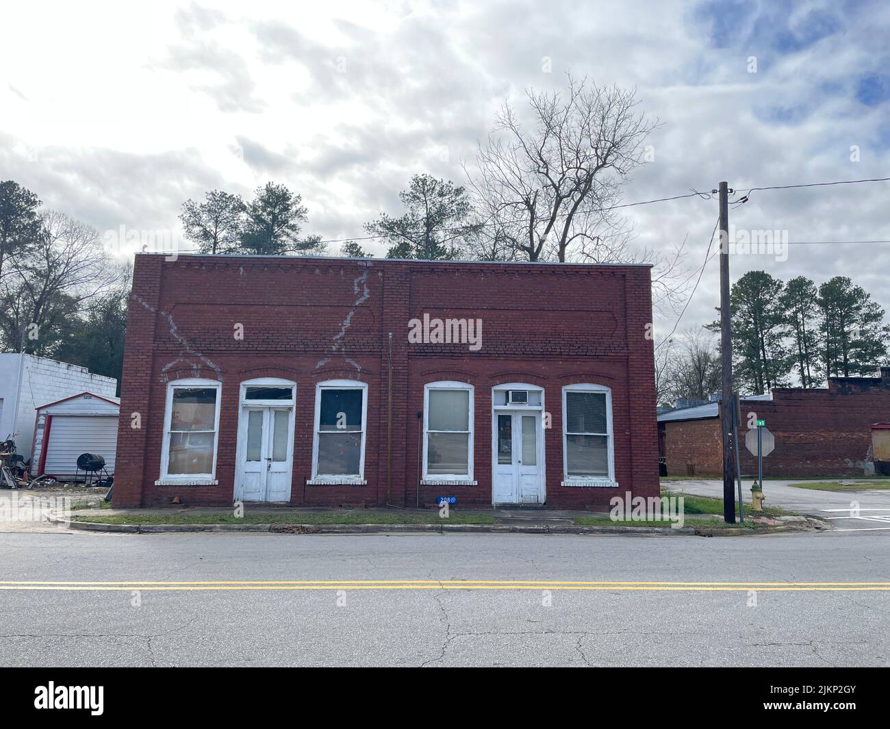 The exterior of a vintage building on a roadside in a small town Stock ...