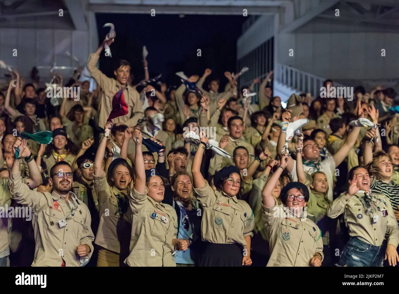 Participants wearing scout uniforms attend the opening ceremony of the ...