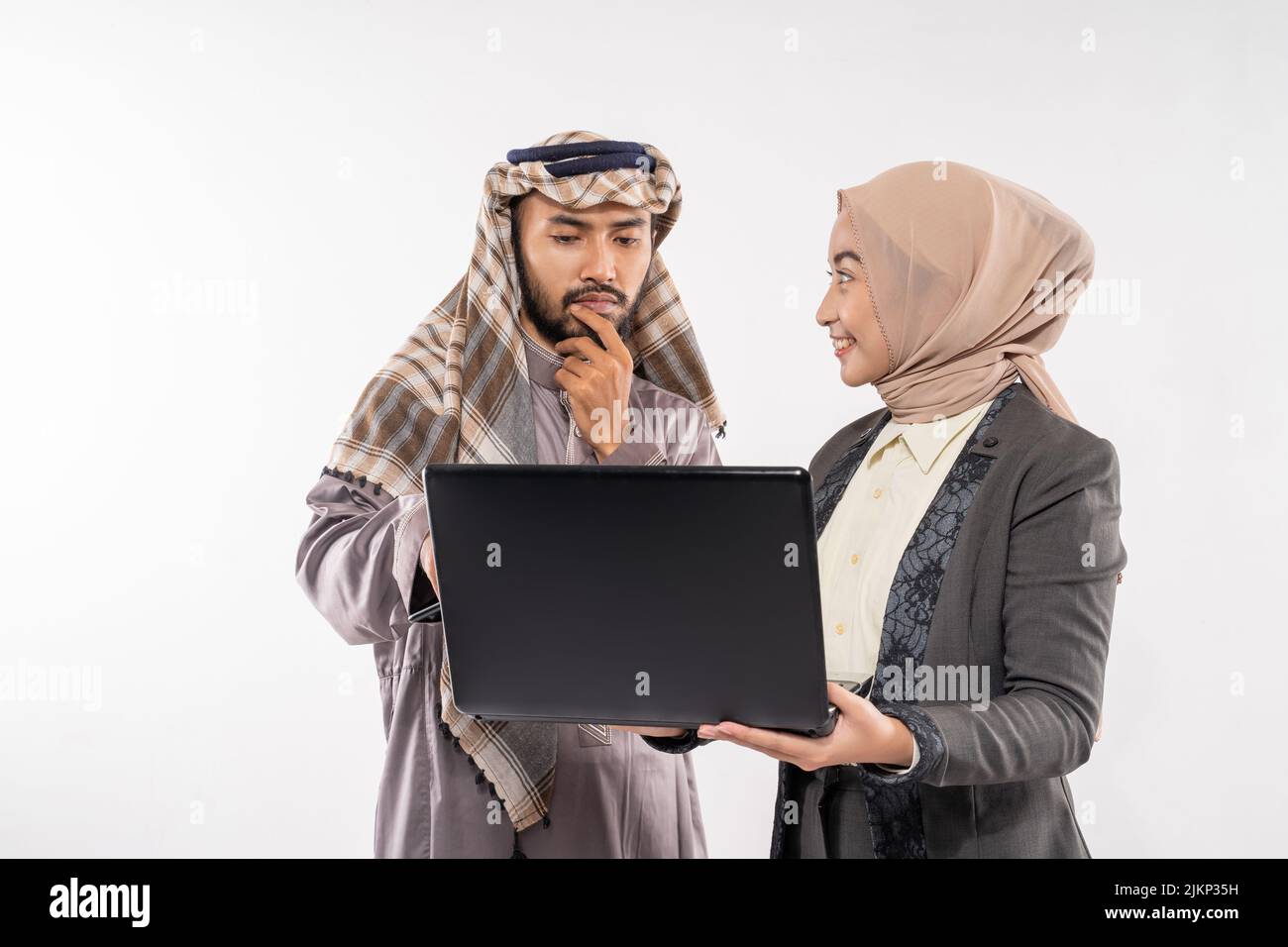 muslim business partner discussing and meeting using laptop pc Stock ...