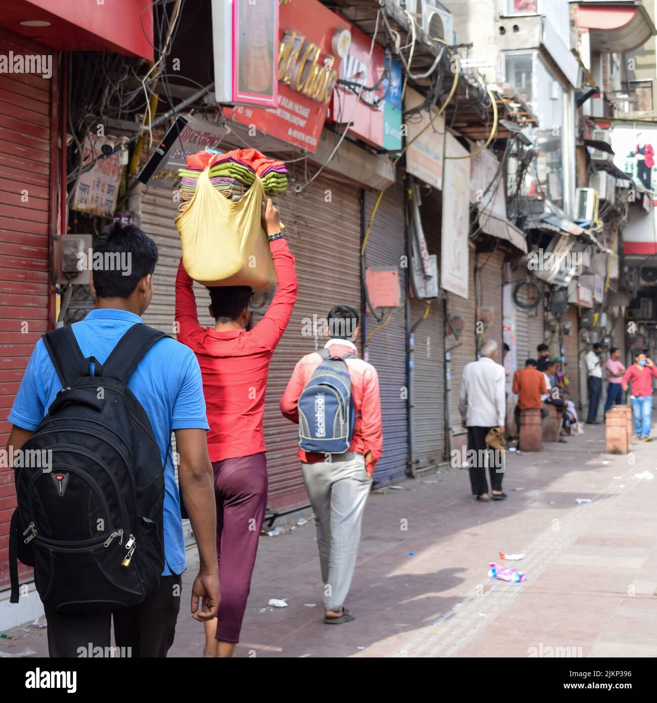 Old Delhi, India, April 15, 2022 - Unidentified group of men walking ...