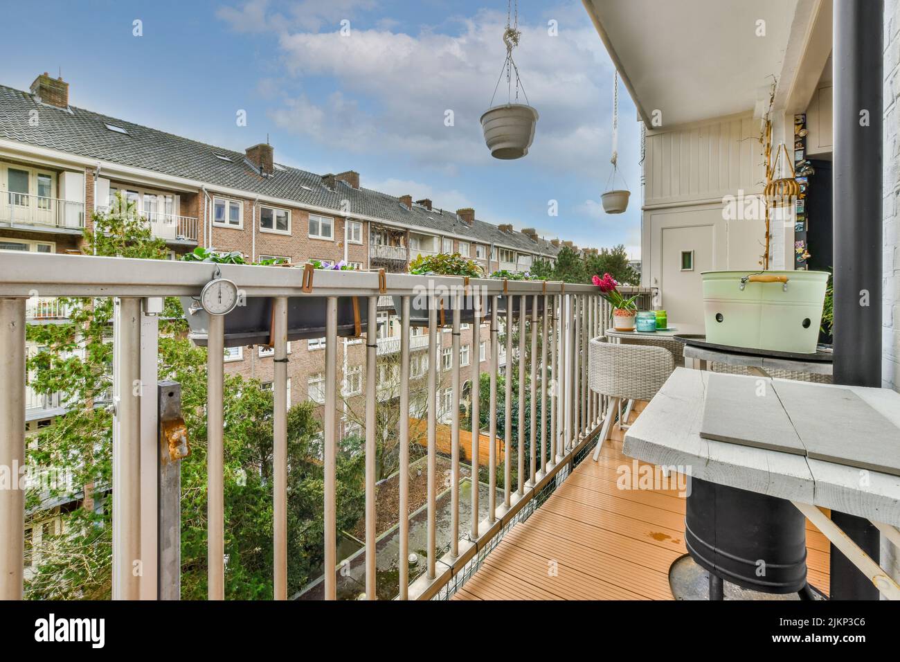 Sitting area in balcony with comfortable furniture around beautiful ...