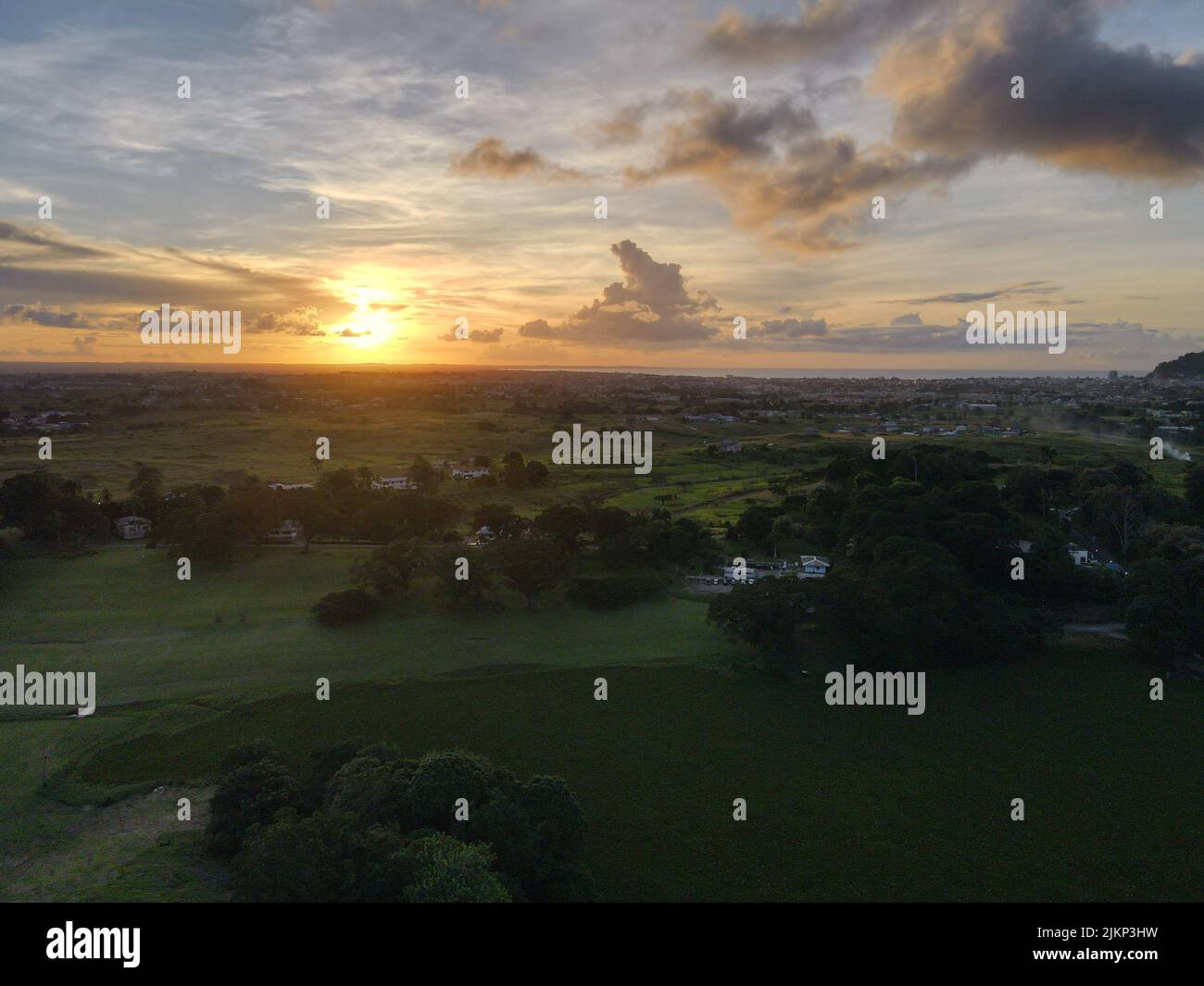 An aerial view of a country village with beautiful view of the dusk sky ...