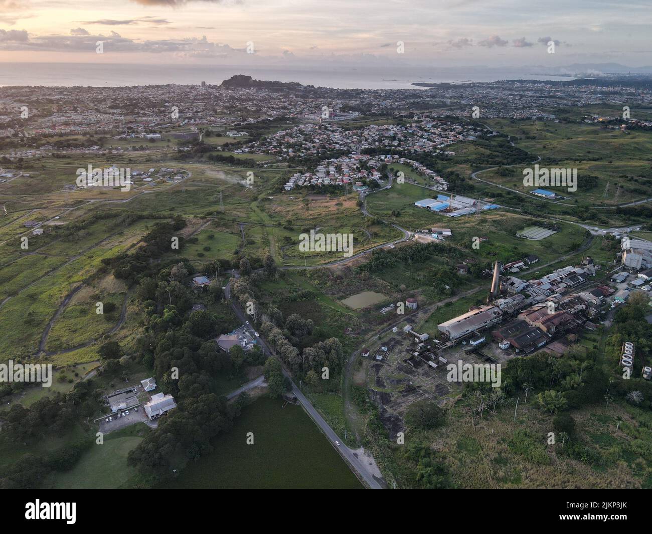 An aerial view of the cityscape of San Fernando against the dusk sky at ...
