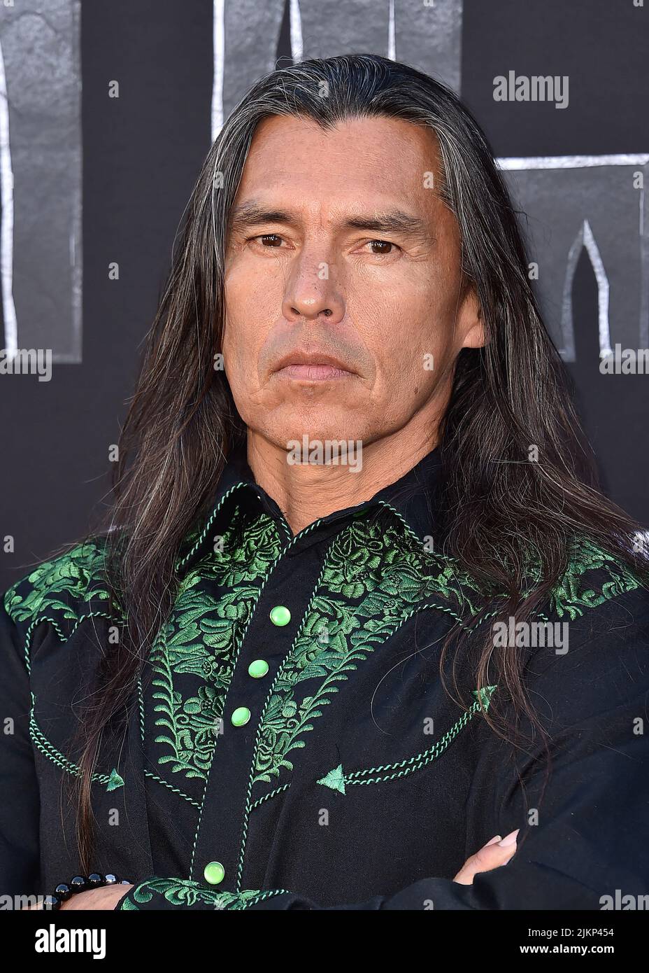 Westwood, USA. 02nd Aug, 2022. David Midthunder walking on the red ...