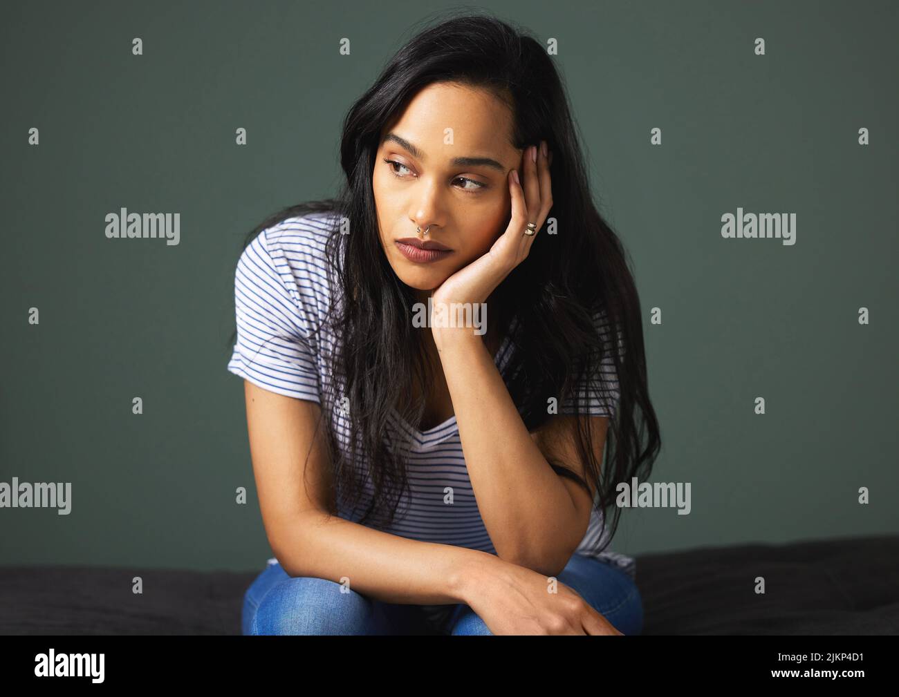 Feeling a little depressed today. an attractive young woman looking ...