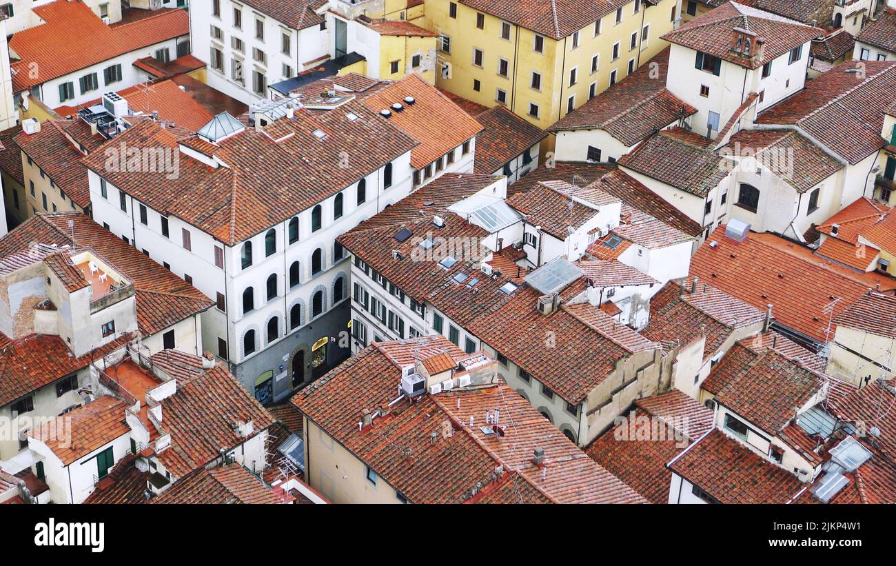 An aerial view of the red rooftops of white and yellow buildings Stock ...