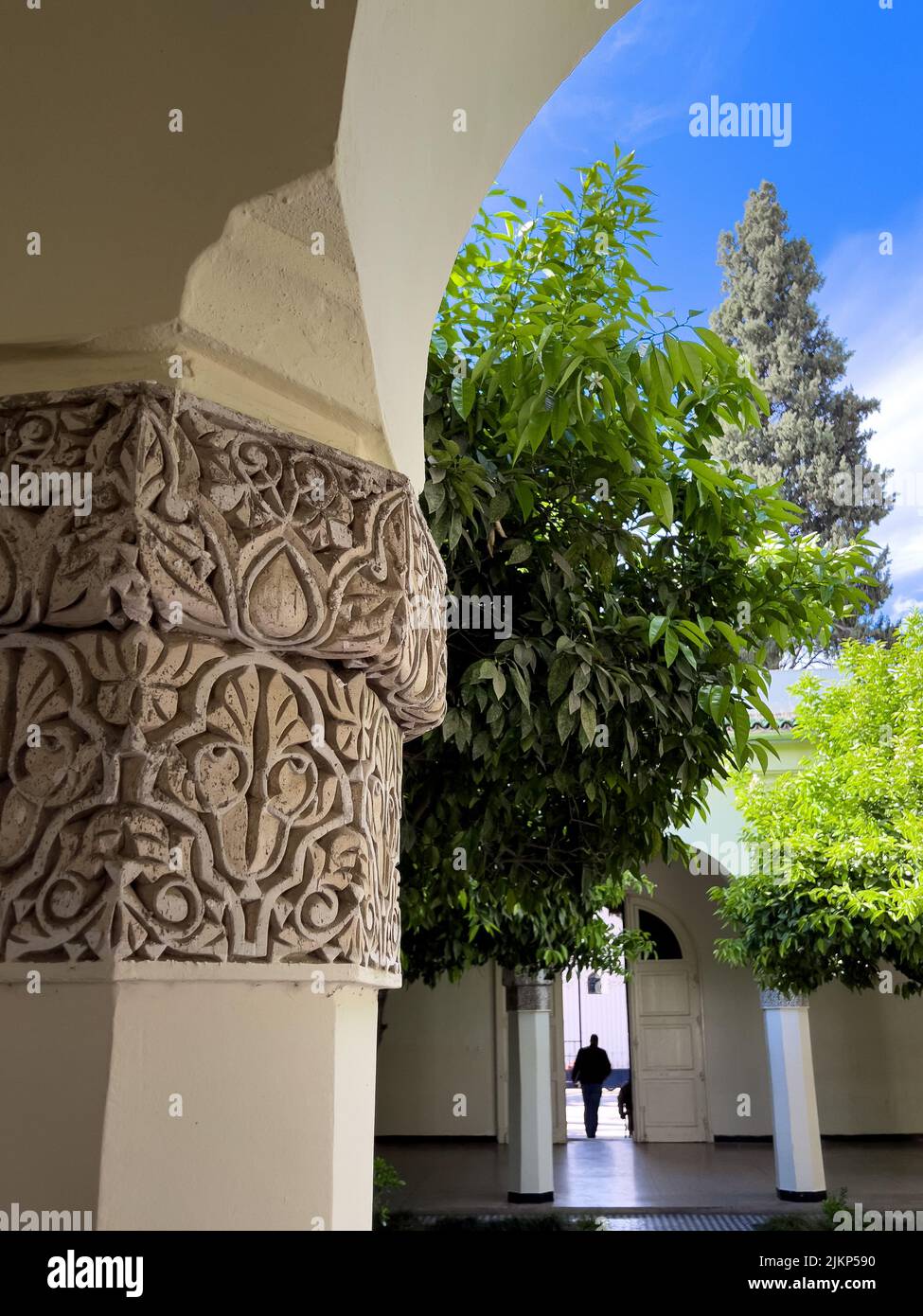 Close-up photo of a hand-carved Moroccan column inside an old riad ...
