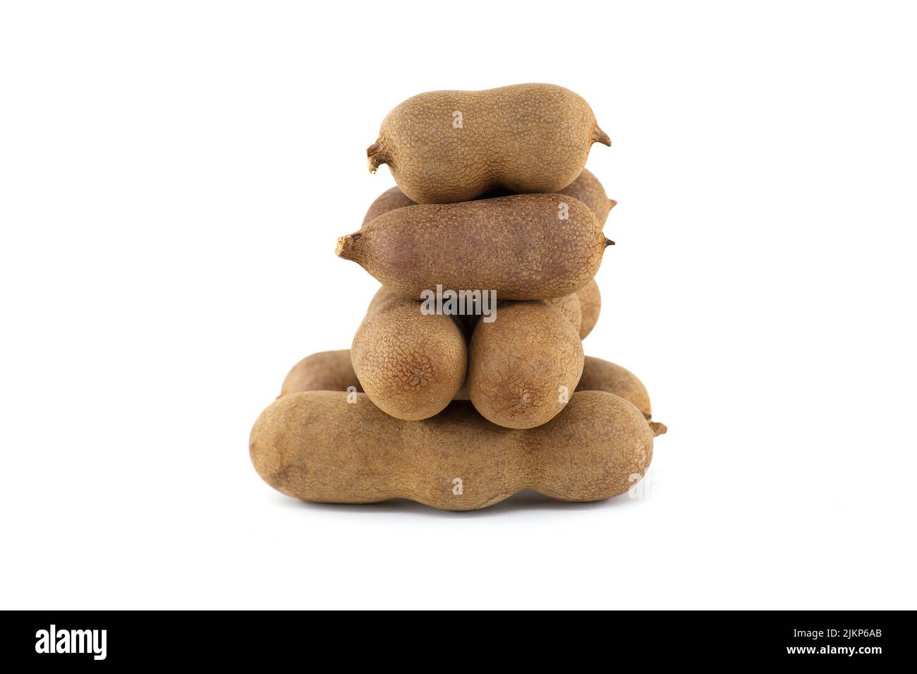 Sweet whole tamarind fruits isolated on white background Stock Photo ...