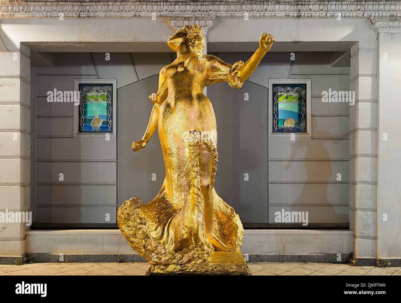 The statue of the golden lady at night in Batumi, Georgia Stock Photo ...