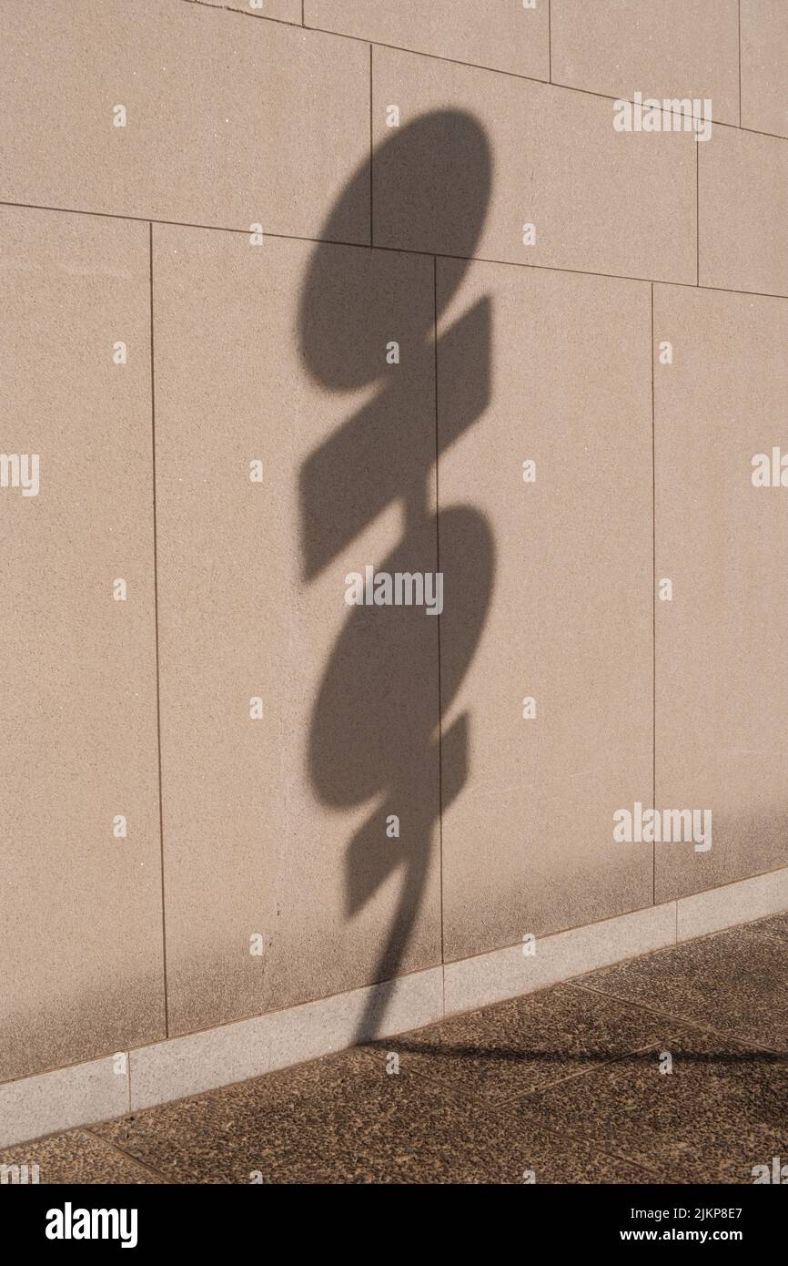 A Reflection of circle and rectangle shaped road signs on a wall Stock ...