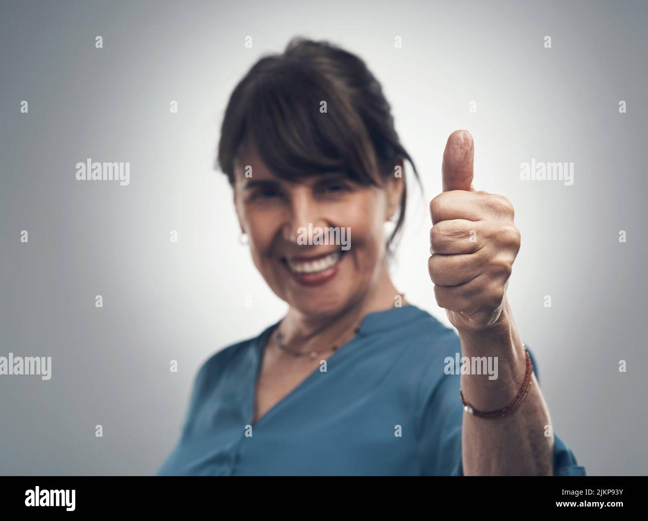 Well done on your sterling work. Studio portrait of a senior woman ...