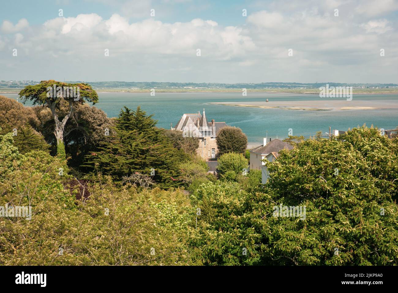 A beautiful high point view of a big old house looking like a castle ...