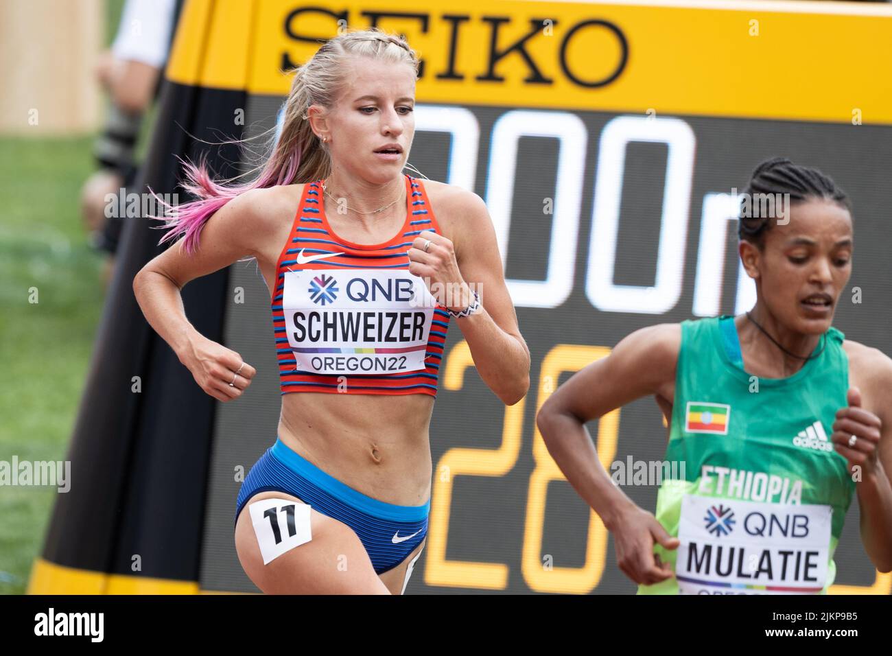 Karissa Schweizer (USA) runs the 10,000 meter final in a time of 30:18 ...