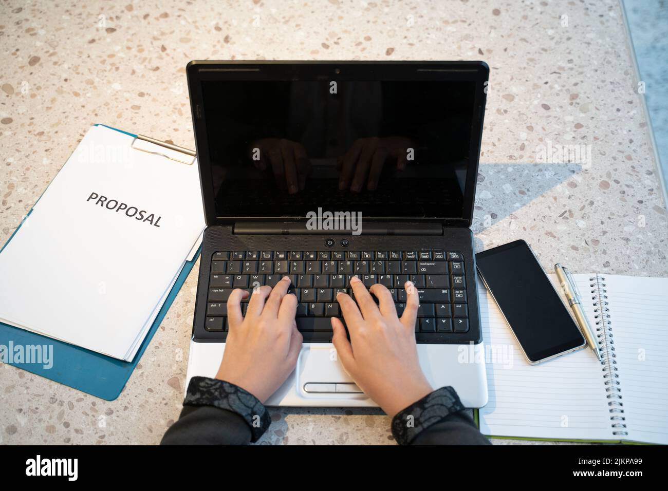 hand typing making a proposal with blank screen laptop Stock Photo - Alamy