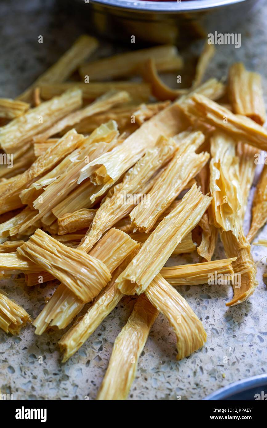 A pile of fresh yuba in the kitchen close-up Stock Photo - Alamy