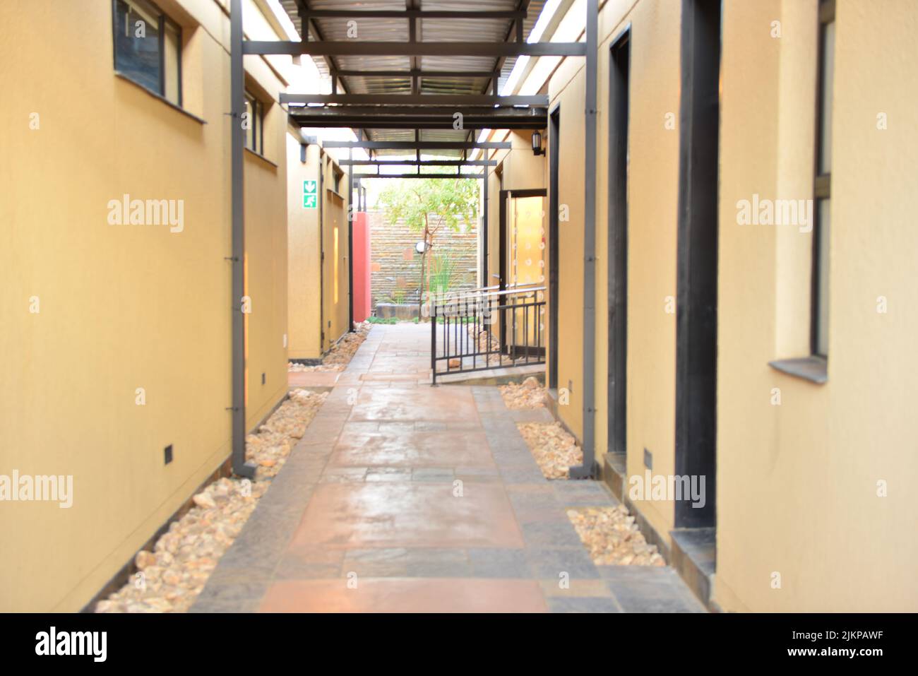The outdoor corridor during sunset with sun flare Stock Photo - Alamy