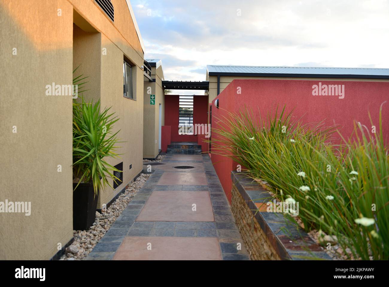 The outdoor corridor during sunset with sun flare and shades Stock ...