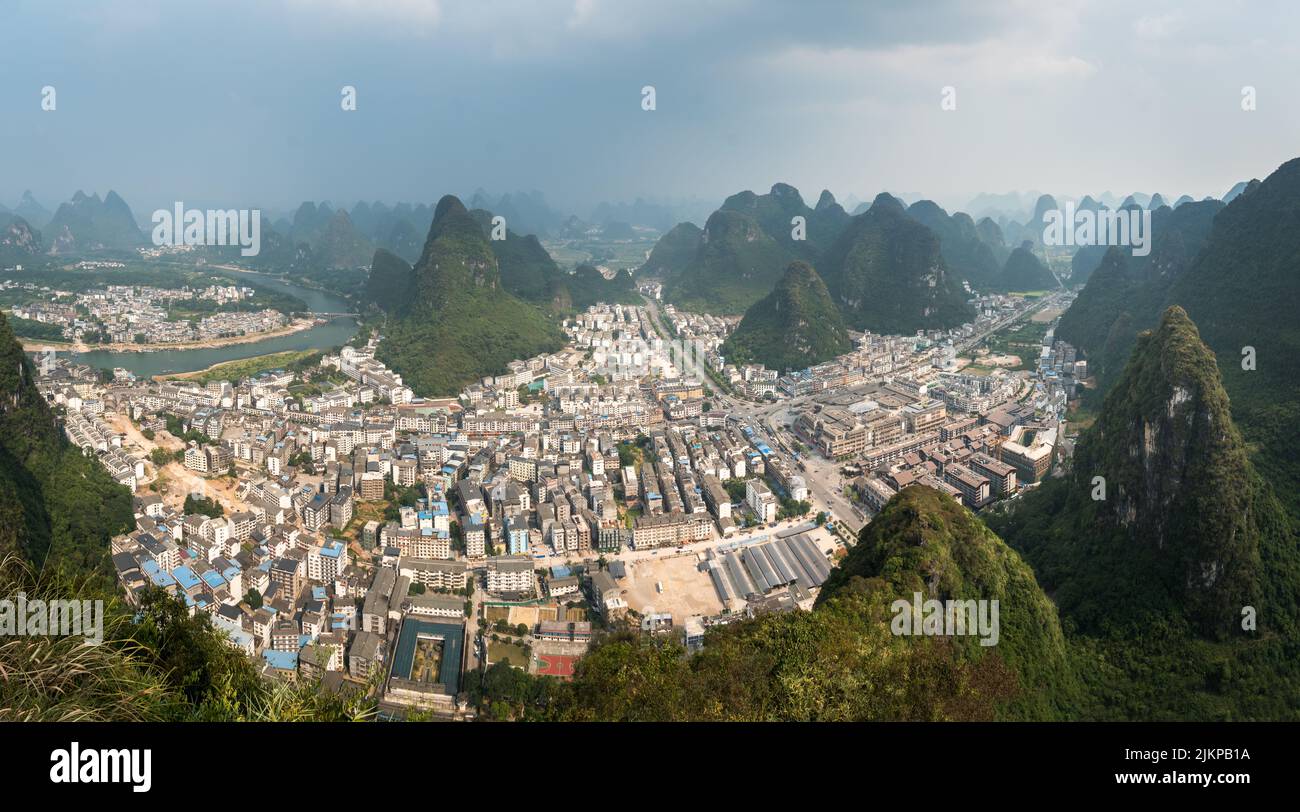 An aerial view of Yangshuo city-county town, beautiful karst mountain ...